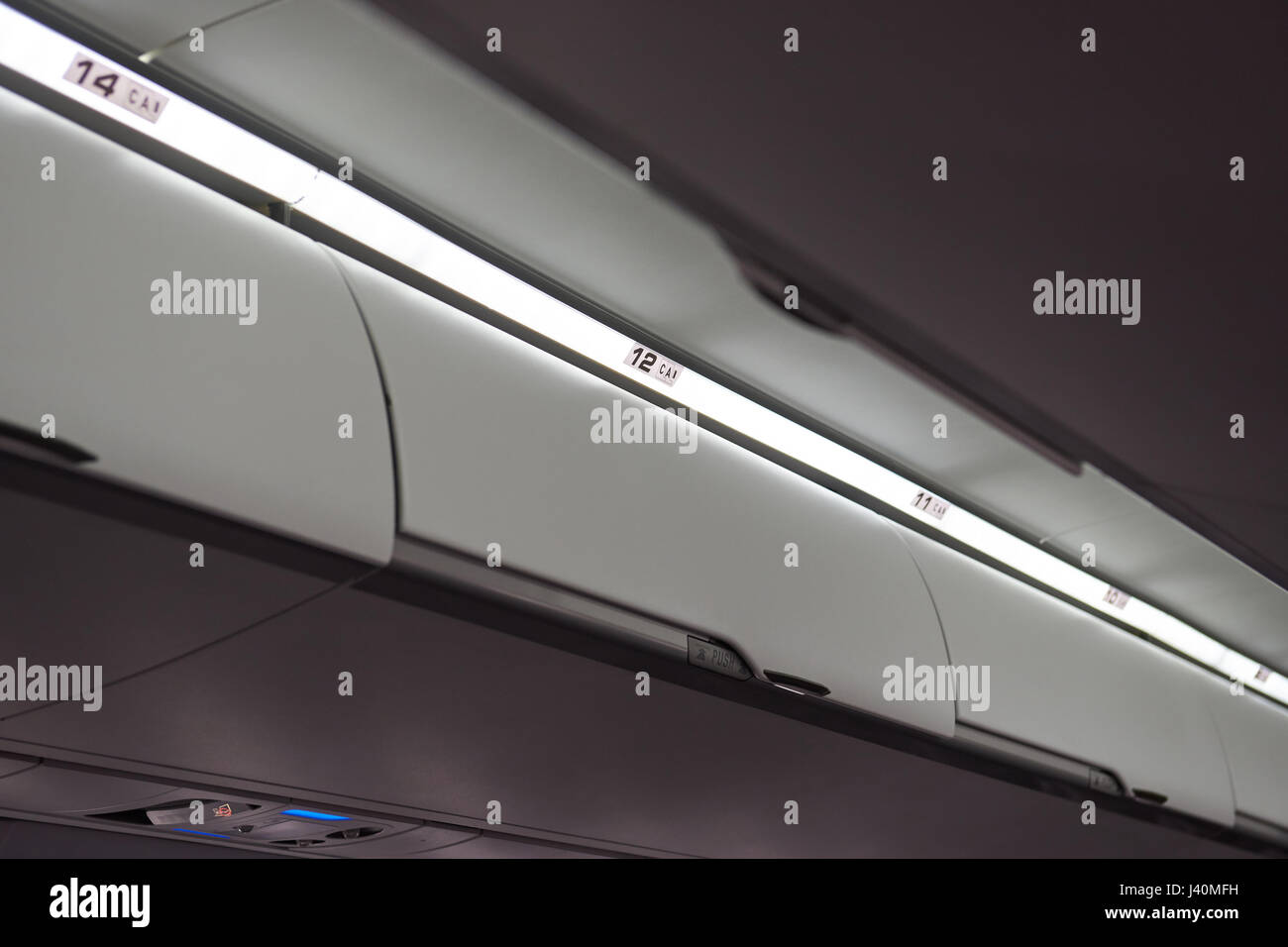 Seat numbers in air plane interior. Economy class travel in airplane ...