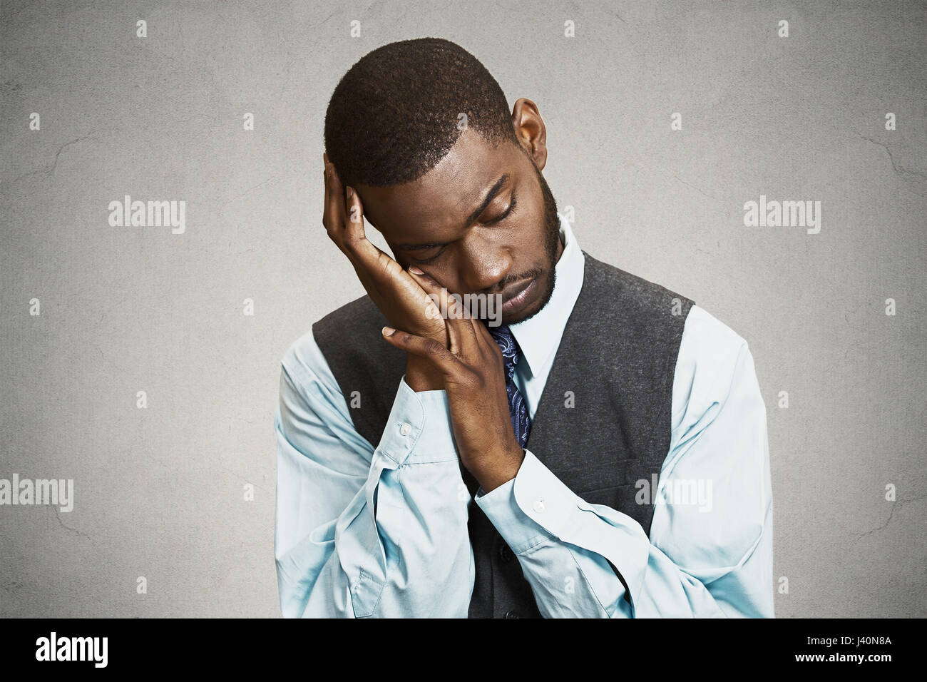 Closeup portrait, headshot Depressed young Man, isolated grey wall ...