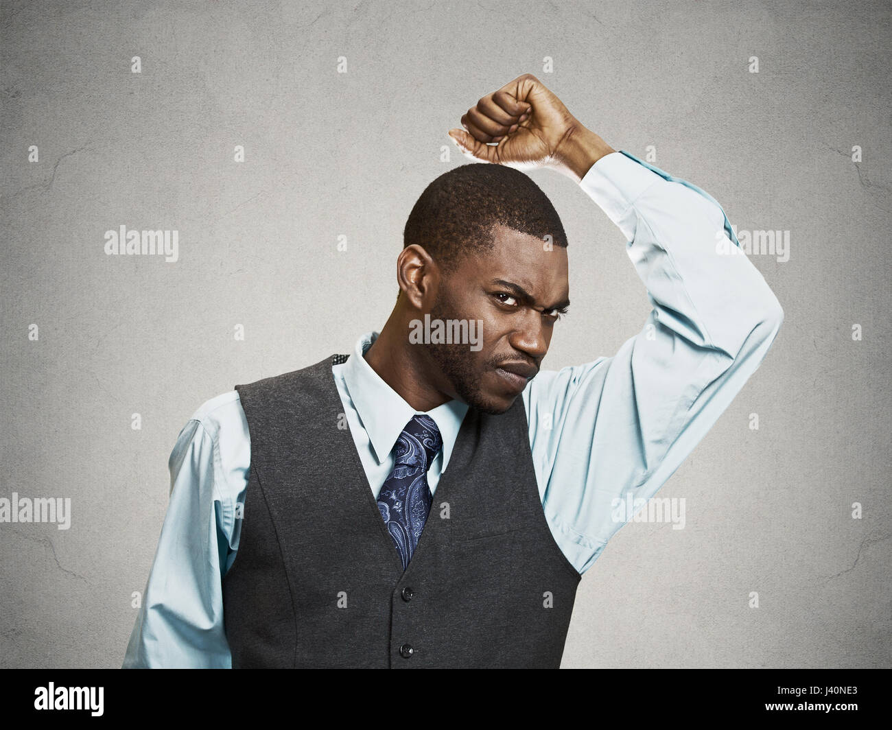 Closeup portrait young Man, Smelling sniffing Armpit, something Stinks ...