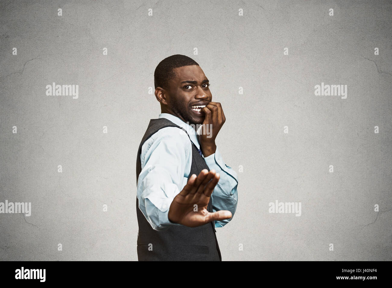 Closeup portrait young scared, afraid, business man, student, citizen ...