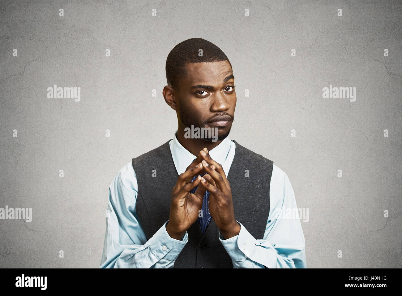 Closeup portrait, sneaky, sly, scheming young business man, worker ...