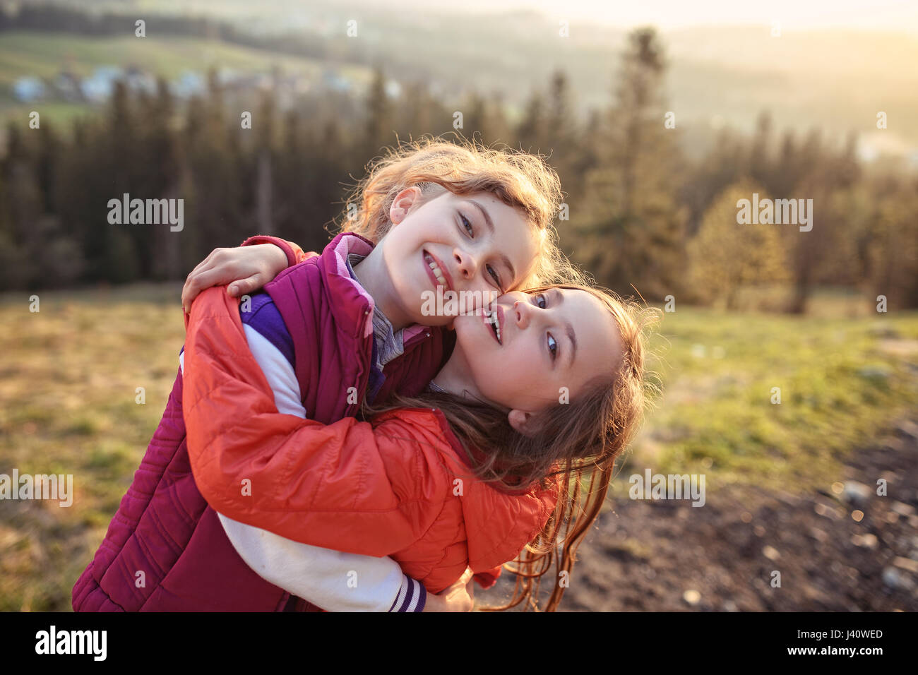 Friendly hug hi-res stock photography and images - Alamy
