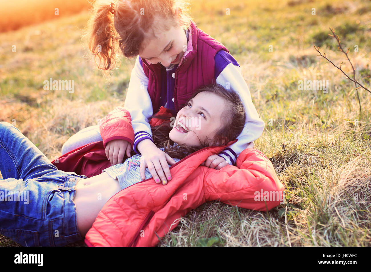 Dear and joyful sisters laugh Stock Photo - Alamy
