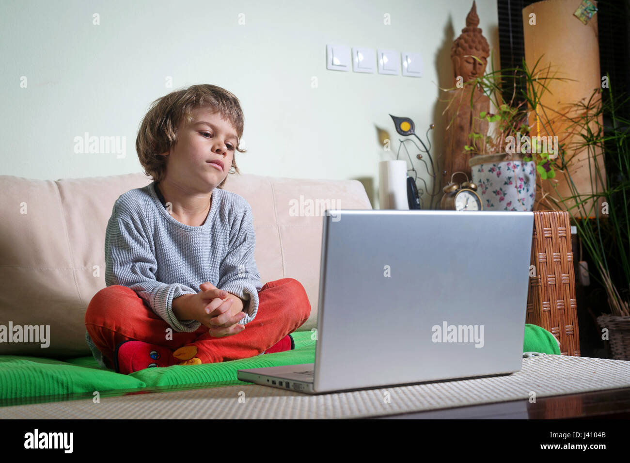 Child watching cartoons hi-res stock photography and images - Alamy