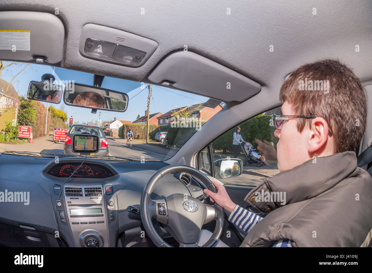 A Model Released 17 year old boy learning to drive in the Uk Stock ...