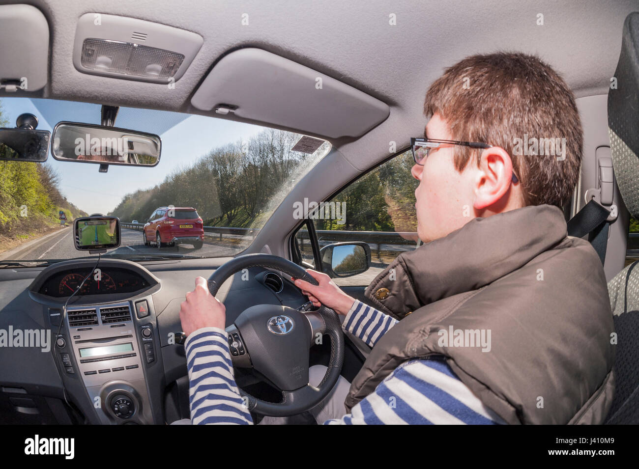 A Model Released 17 year old boy learning to drive in the Uk Stock ...
