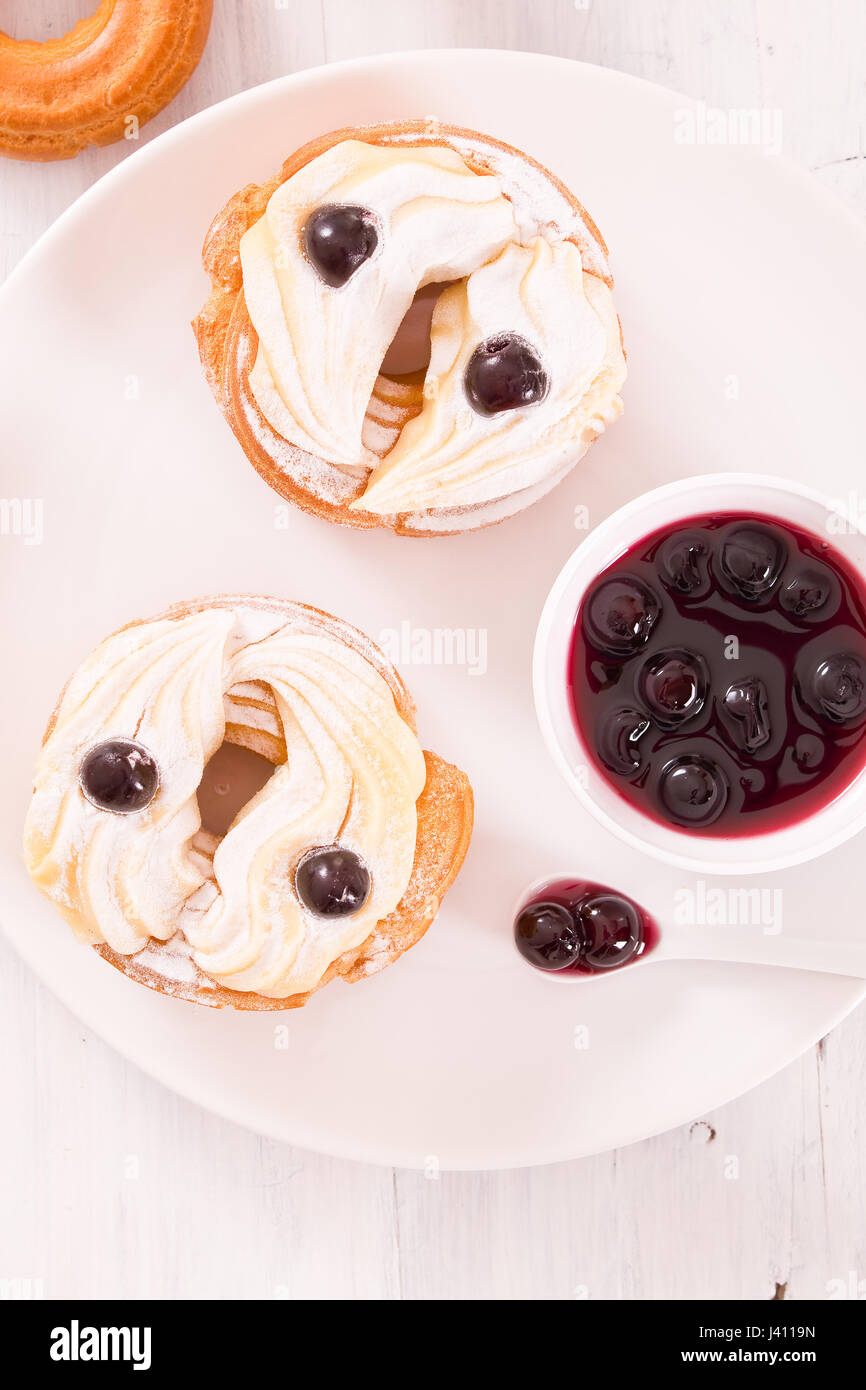 Zeppole with pastry cream Stock Photo - Alamy