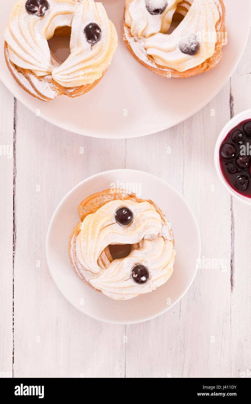 Zeppole with pastry cream Stock Photo - Alamy