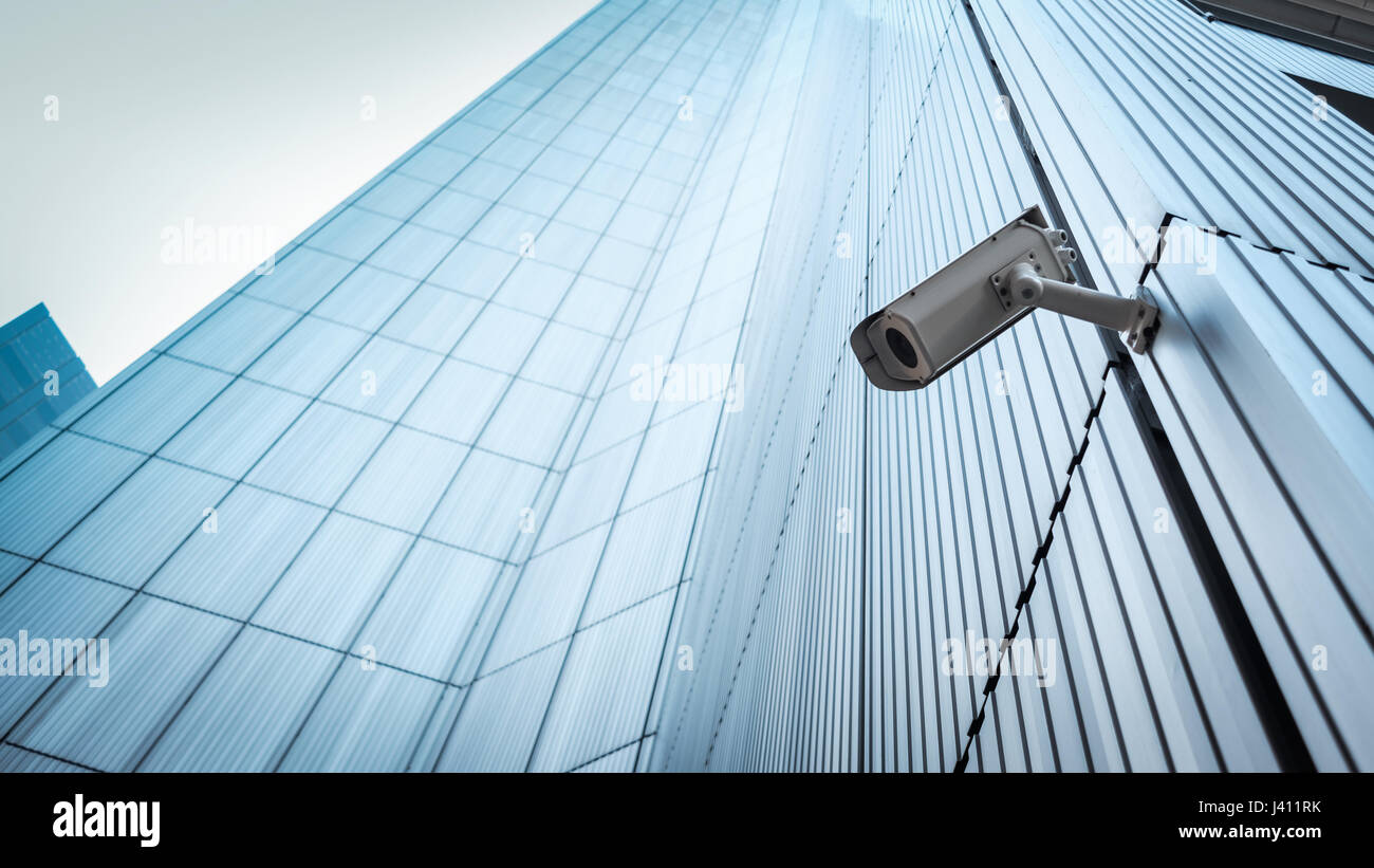 Outdoor CCTV Security camera installed on the building wall in the city ...