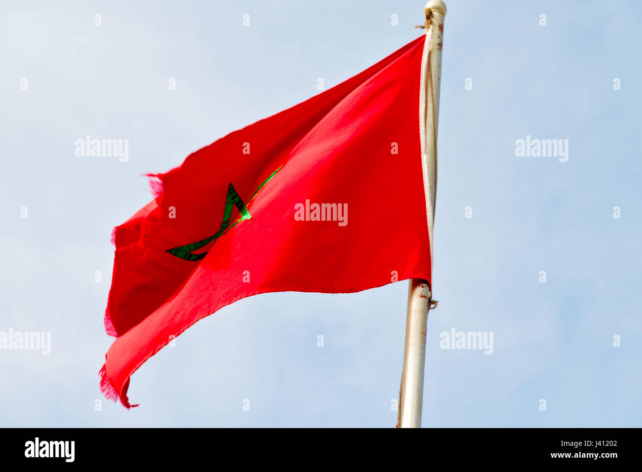 waving flag in the blue sky tunisia colour and wave Stock Photo - Alamy