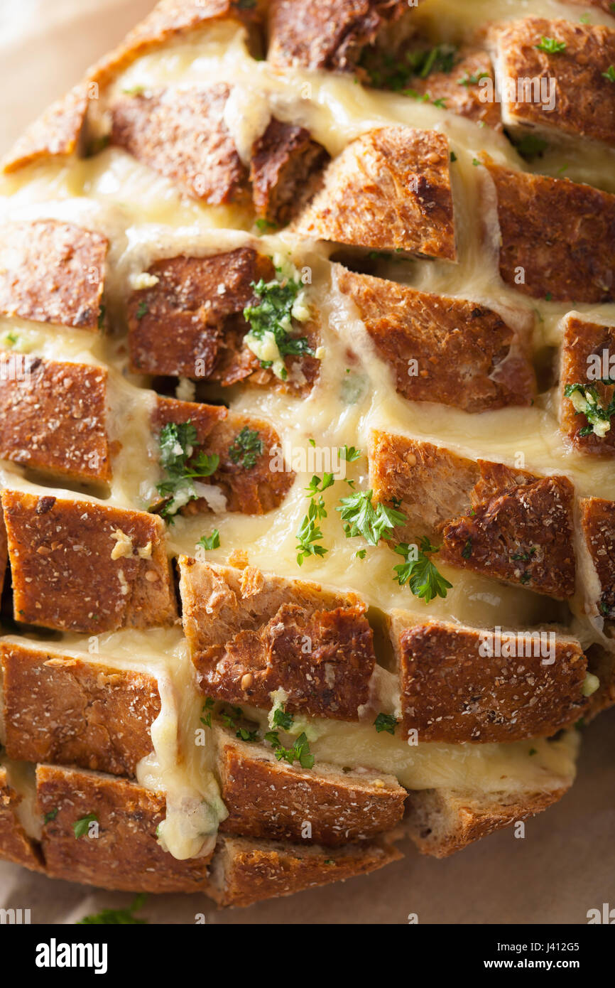roasted party bread with melted cheese butter herbs Stock Photo - Alamy