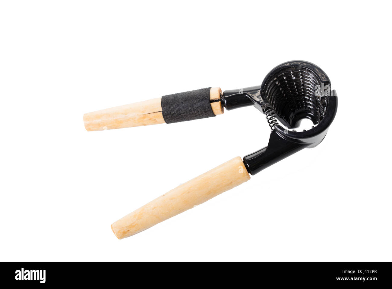 Nutcracker with wooden handle is broken. Isolated on the white ...