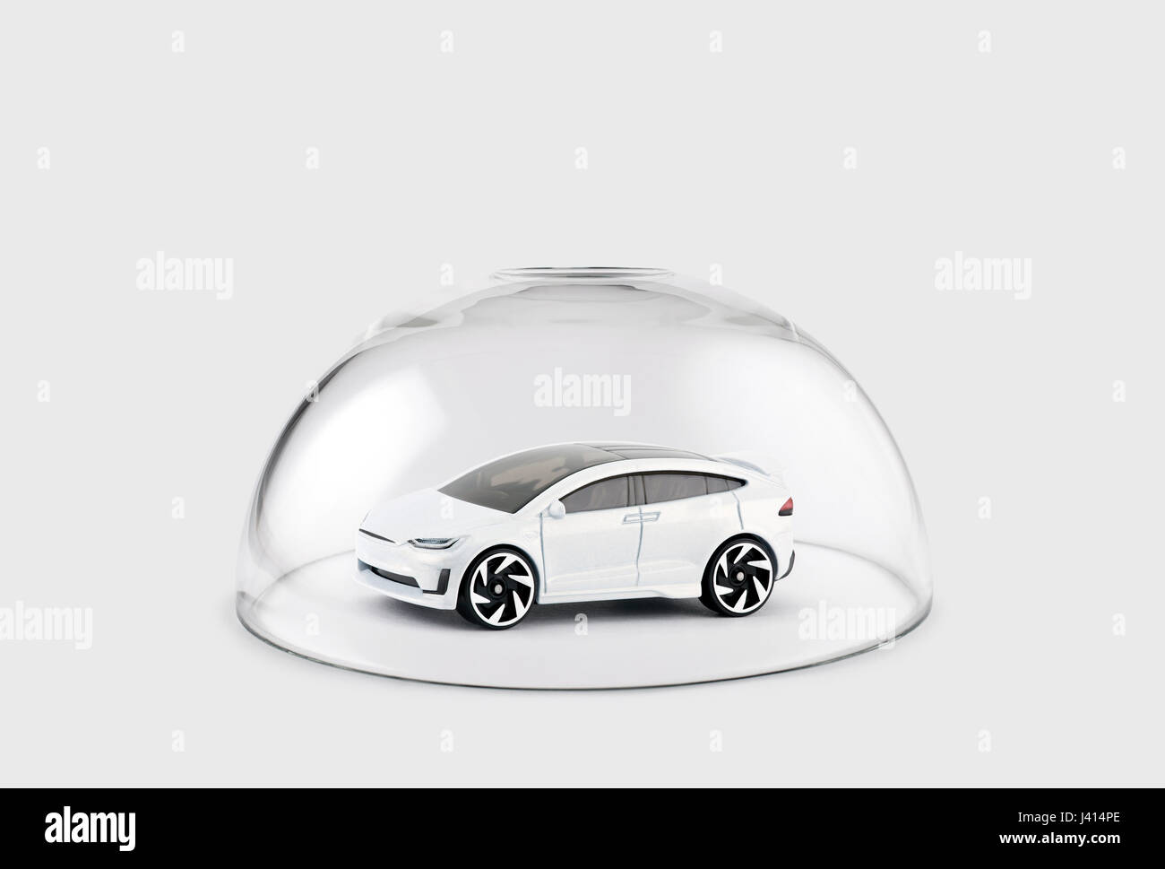 Modern white car protected under a glass dome Stock Photo - Alamy