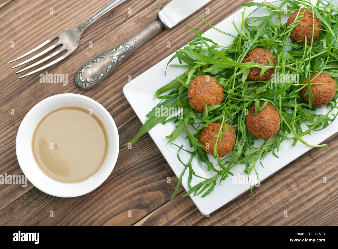 Fresh vegetarian falafel with arugula on plate top view Stock Photo - Alamy