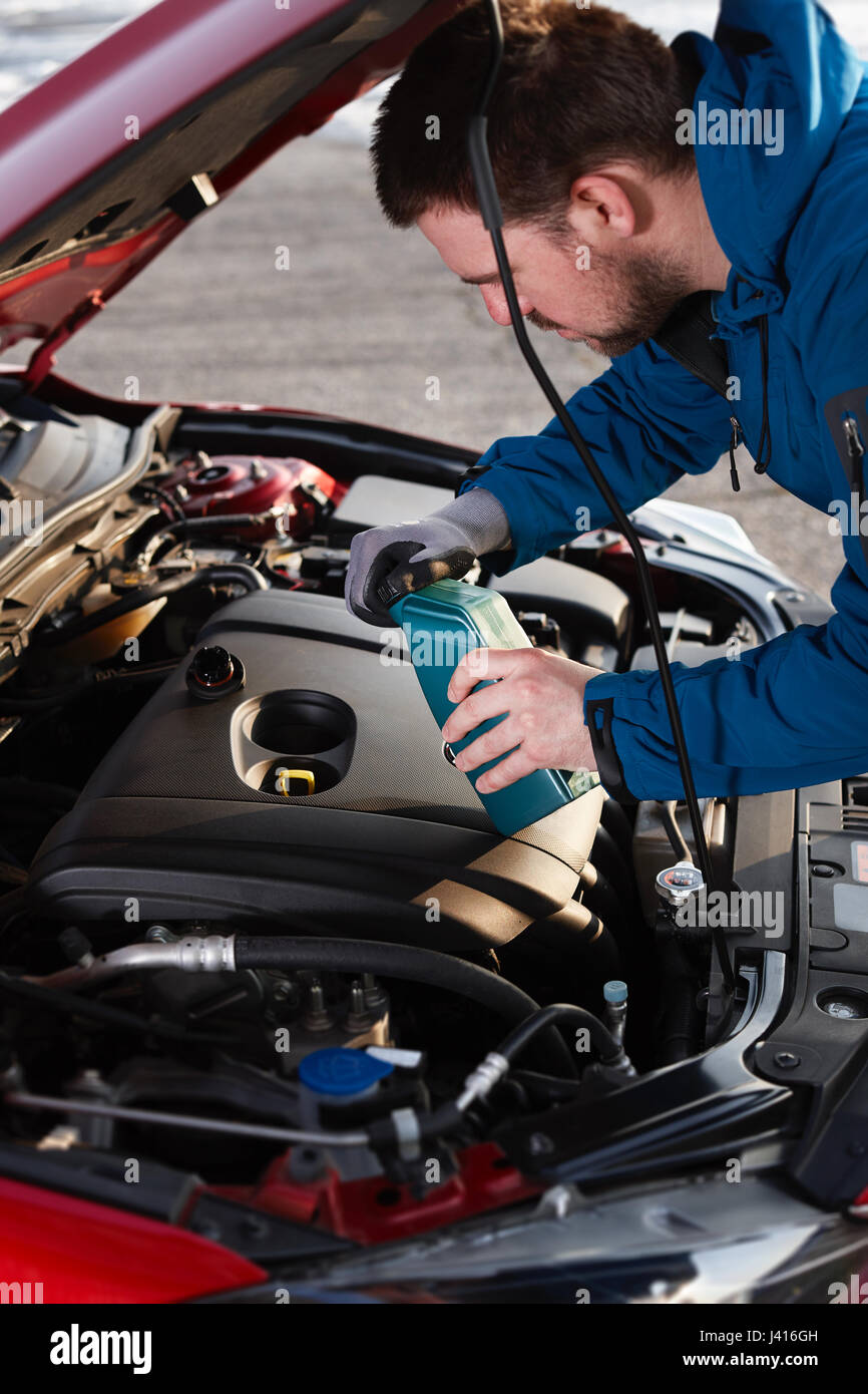 Inspecting car oil hi-res stock photography and images - Alamy