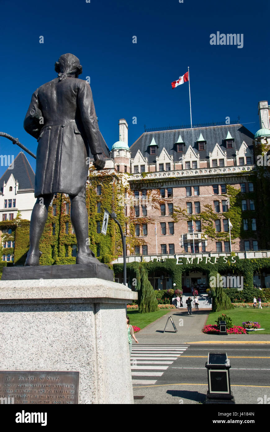 A statue of Captain James Cook stands by the inner harbor near The ...