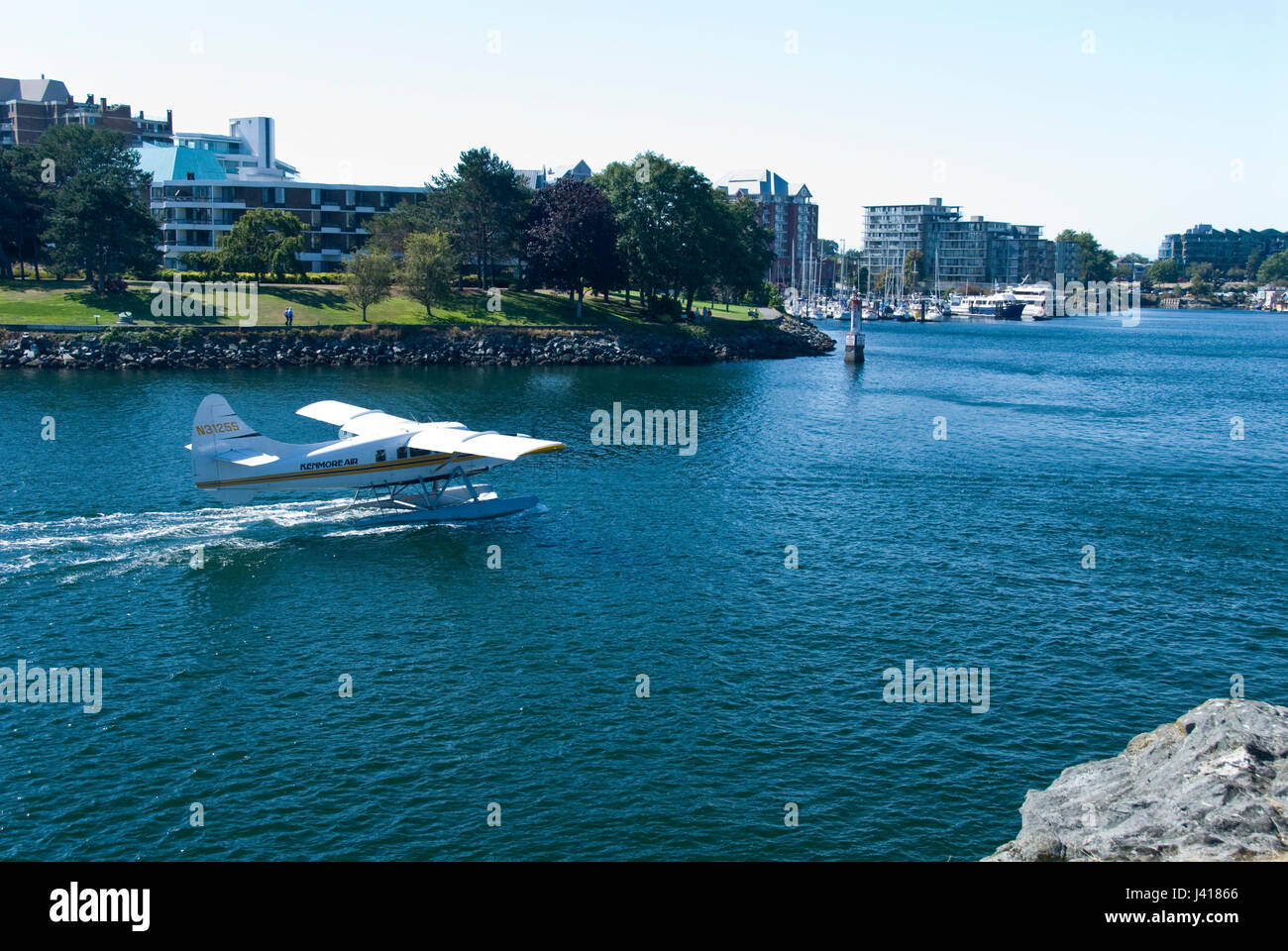 A floatplane (seaplane) taxis out of the inner harbor at Victoria ...