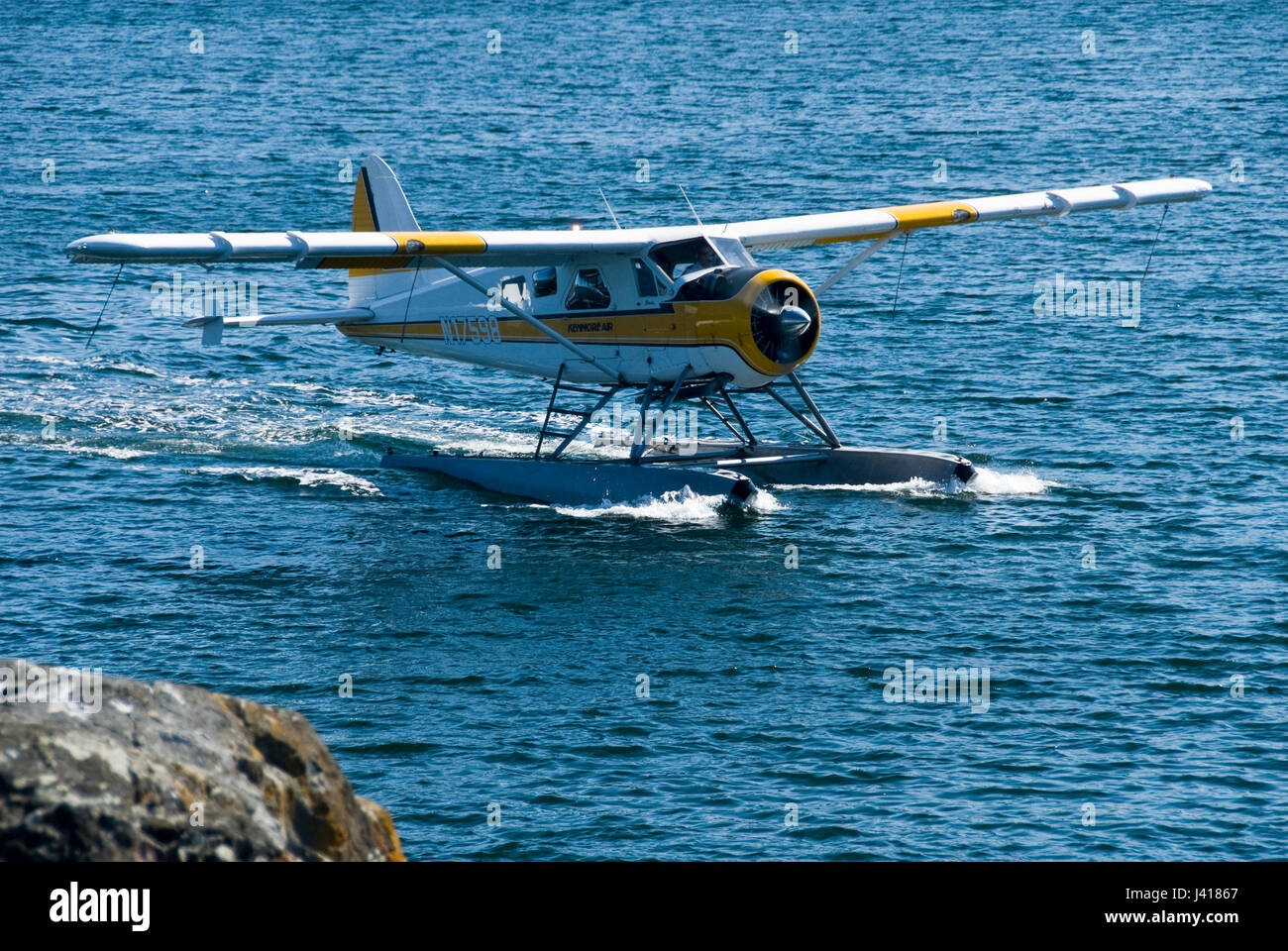 A floatplane (seaplane) taxis out of the inner harbor at Victoria ...