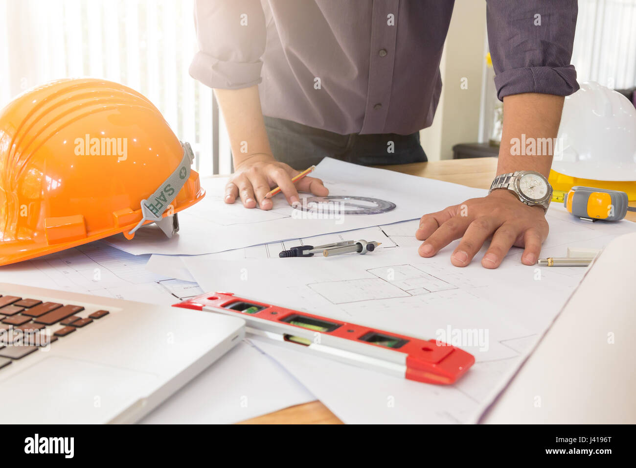 Architect concept, Architects office working with blueprints Stock ...