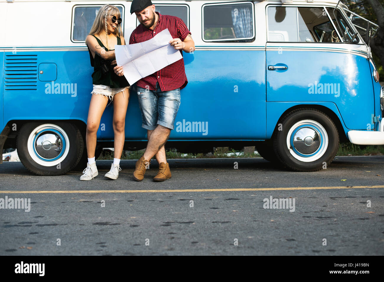 People Checking The Map for Direction on Road Trip Stock Photo - Alamy