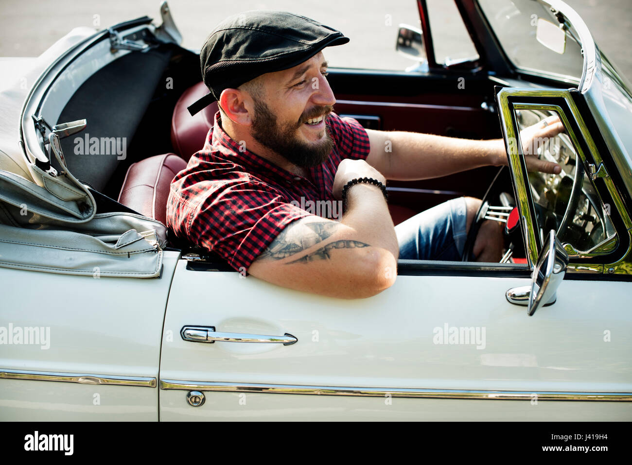 Man Driving a Car with Windows Down Stock Photo - Alamy
