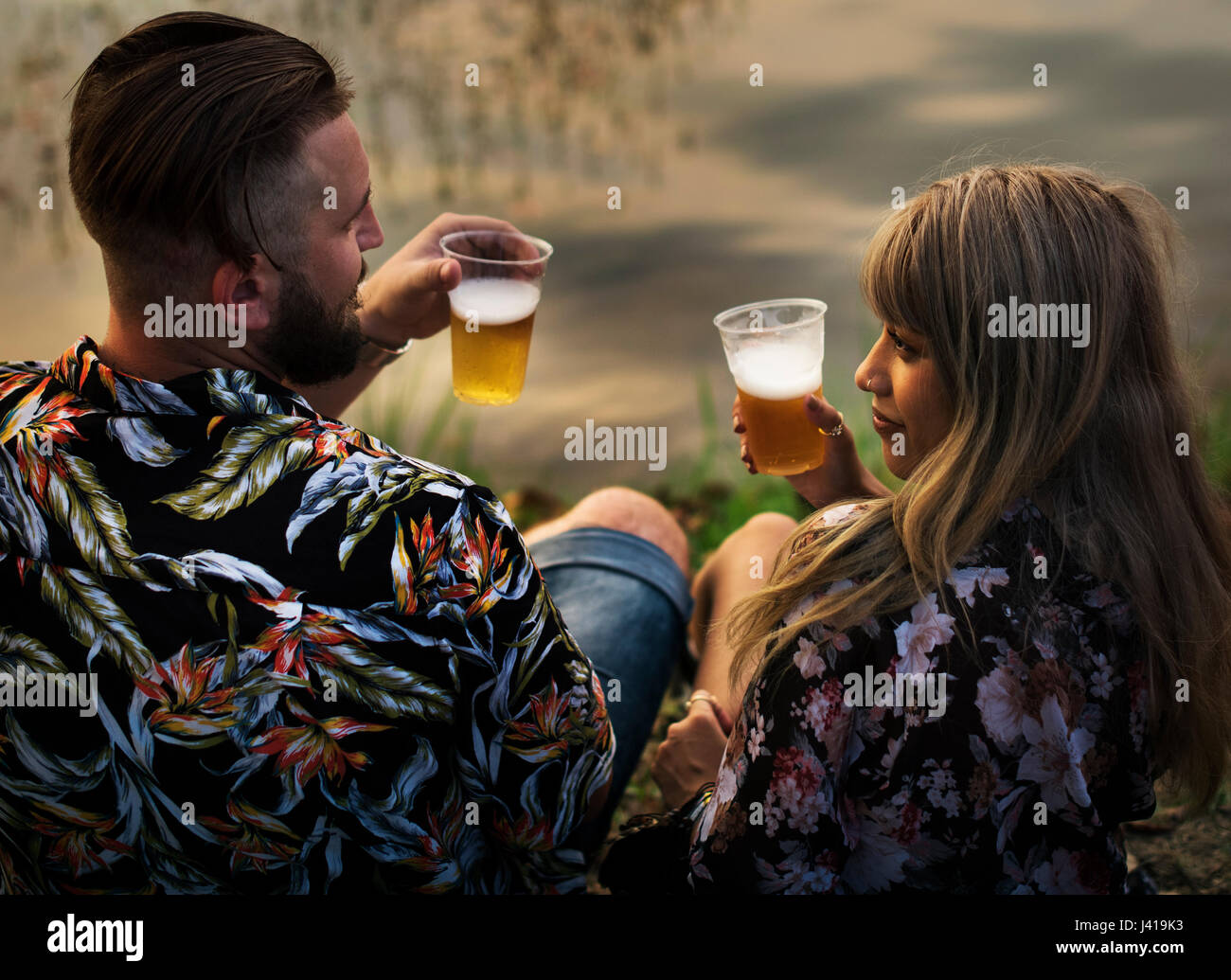 Group of Friends Drinking Beers Enjoying Music Festival Together Stock ...