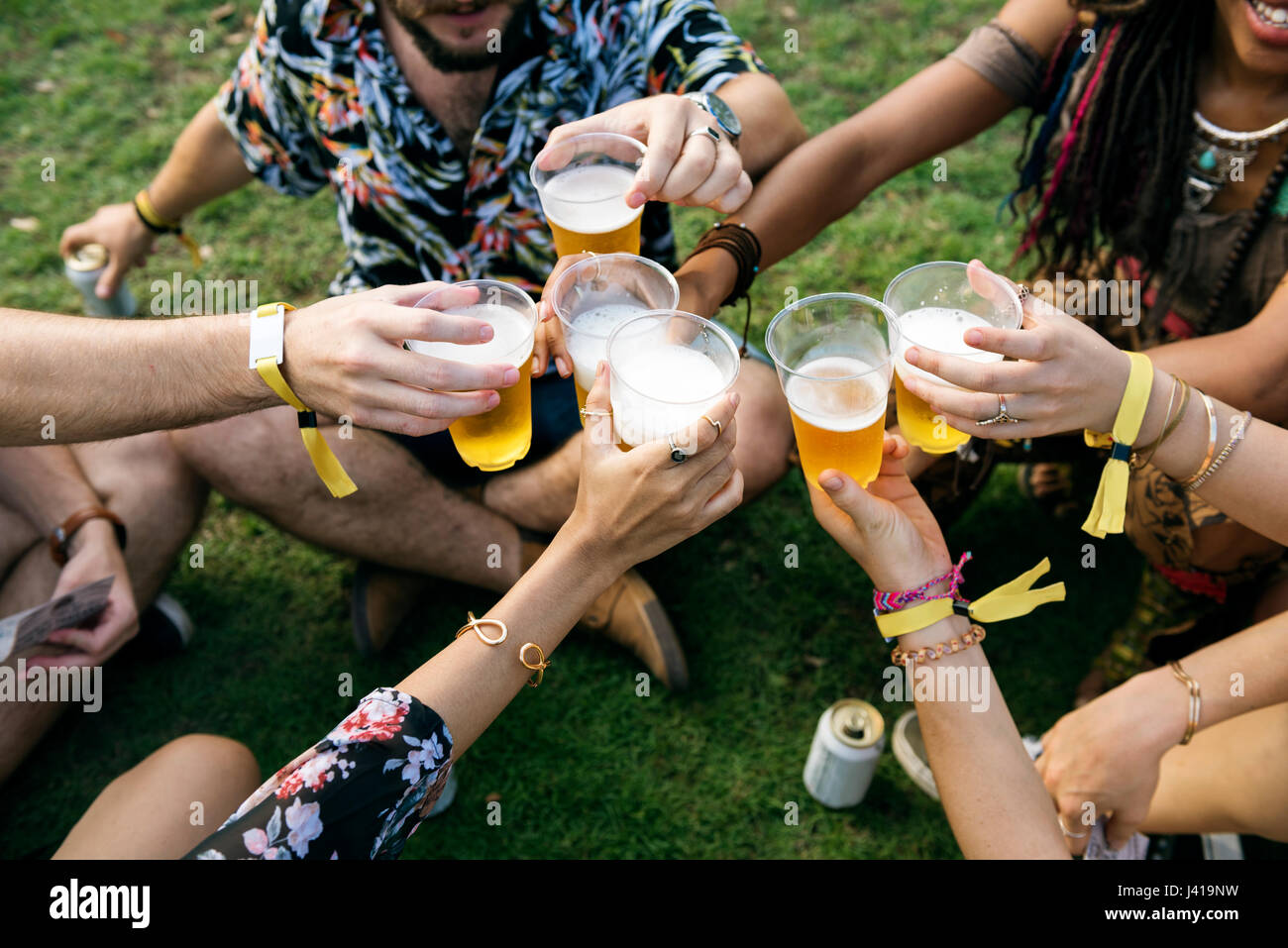 Group of Friends Drinking Beers Enjoying Music Festival Together Stock ...