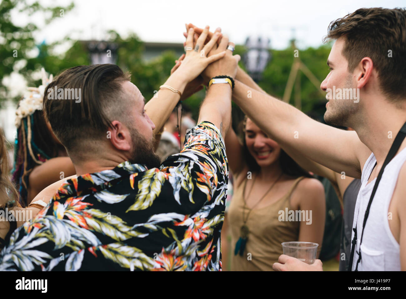 Friends hands together hi-res stock photography and images - Alamy