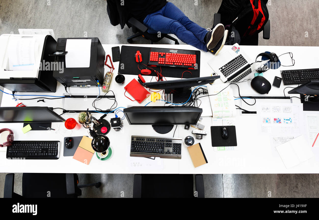 Office man feet table hi-res stock photography and images - Alamy