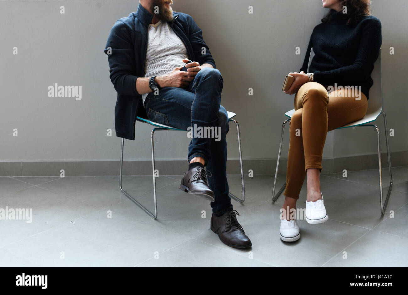 People Talking Together During Office Break Time Stock Photo - Alamy