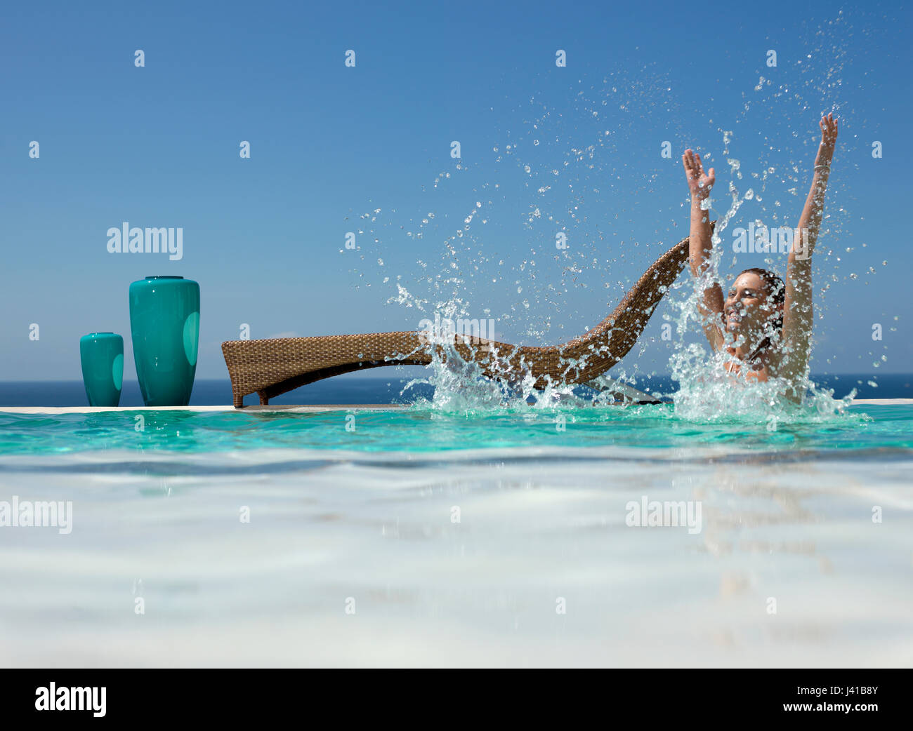 Young woman in pool, Mallorca, Spain Stock Photo - Alamy