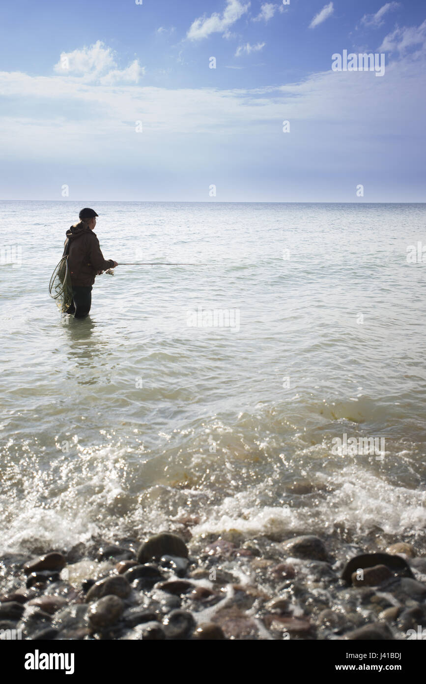 Fisherman on the Baltic shore in the Hohen Western Pomerania Lagoon ...