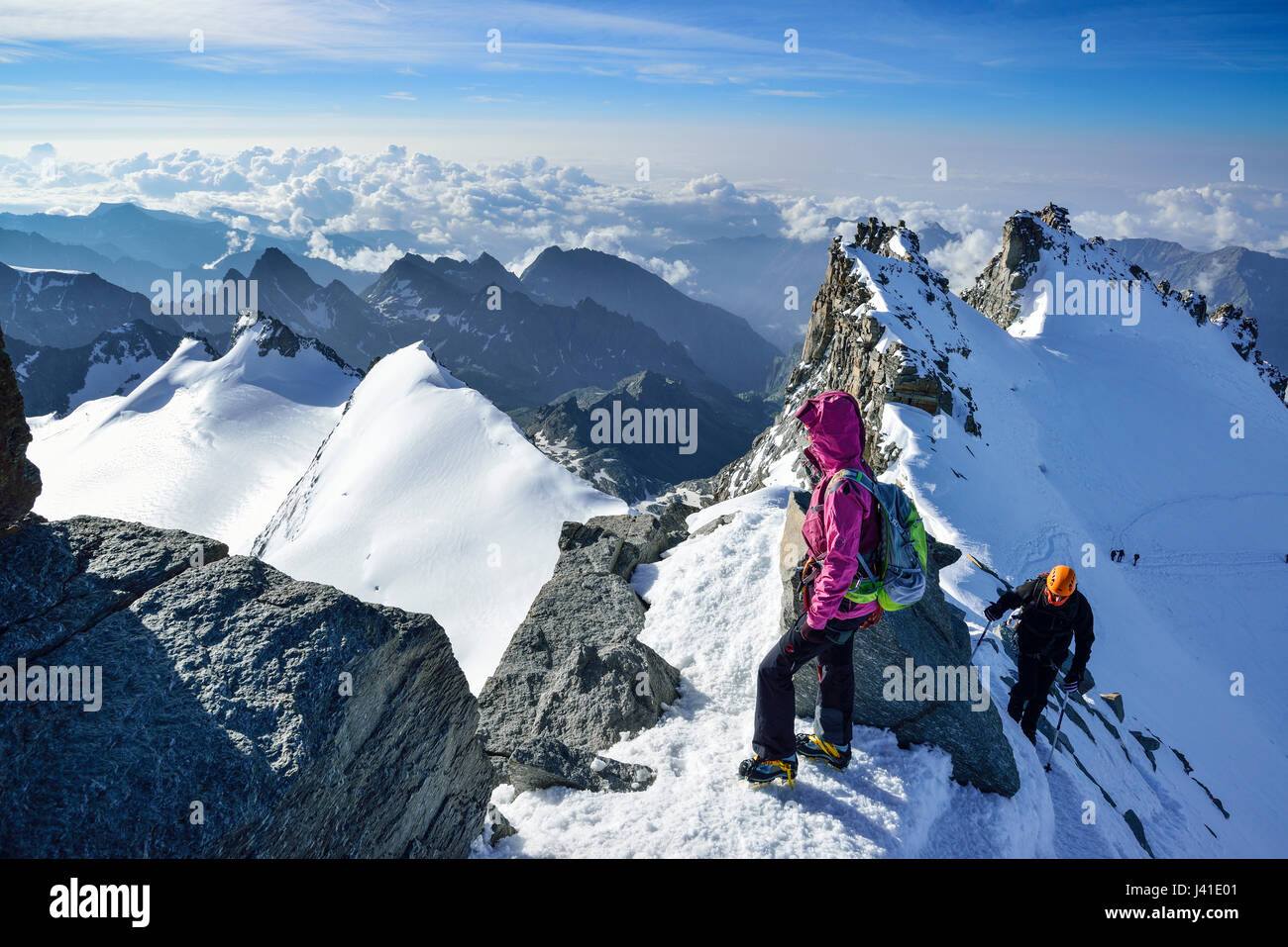Woman standing at southern ridge of Gran Paradiso, Gran Paradiso, Gran ...