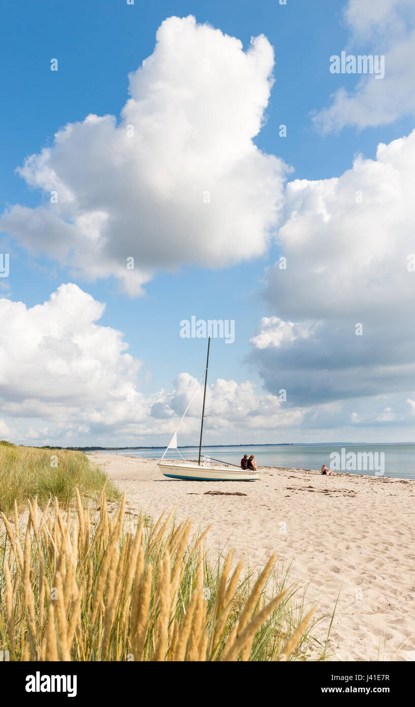Sailboat at sandy beach, Marielyst, Falster, Denmark Stock Photo - Alamy