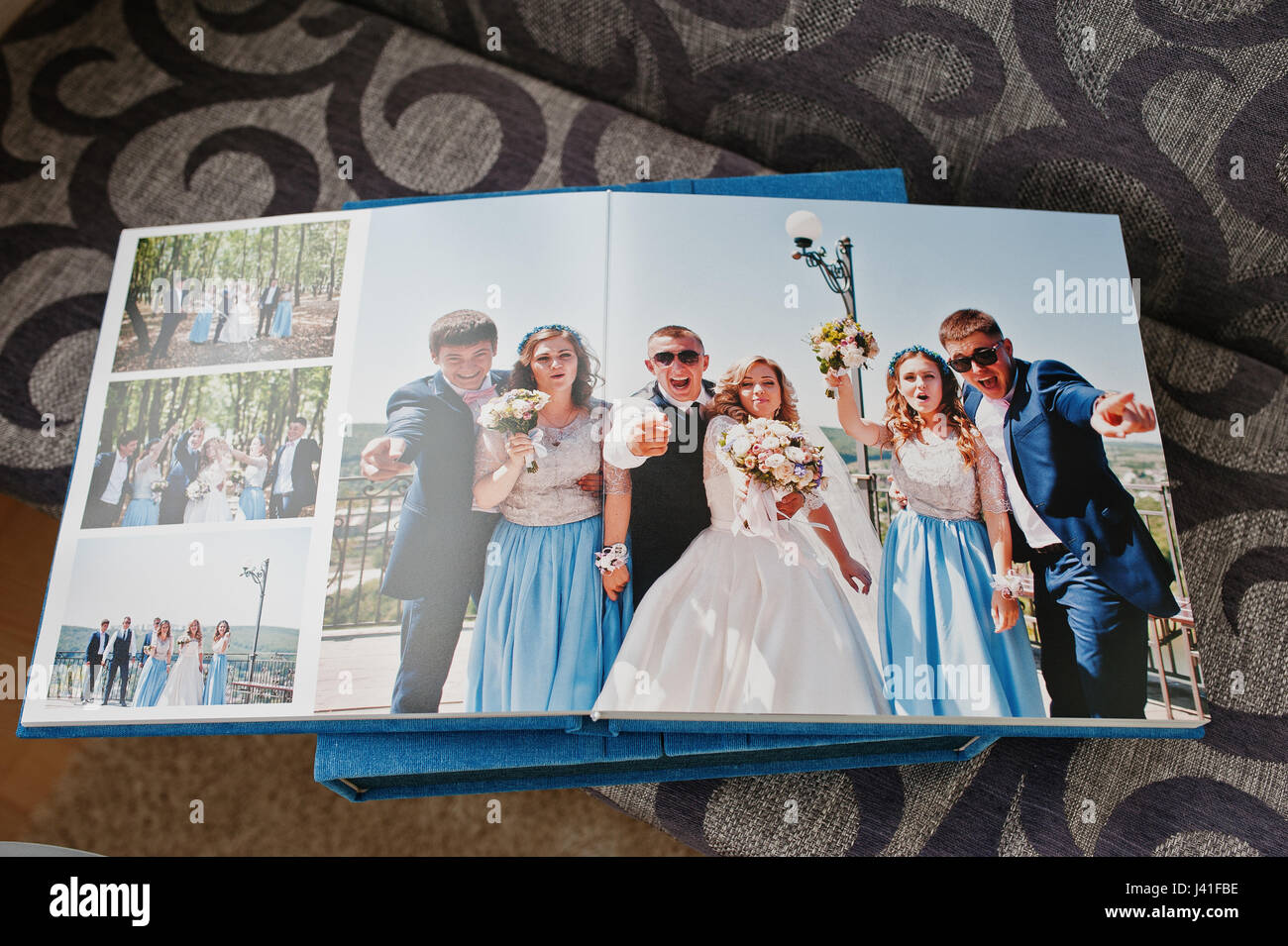 Open pages of wedding photo book and album Stock Photo - Alamy