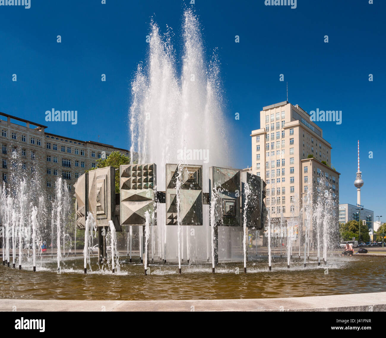 East German era fountain at Strausberger Platz on Karl Marx Allee in ...