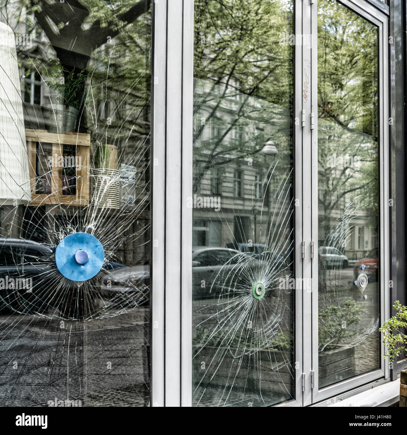 Damaged shop windows in Kreuzberg, Berlin Stock Photo - Alamy