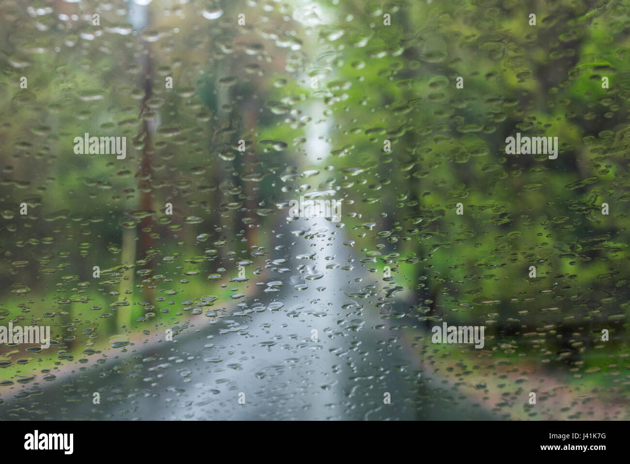 Country road in rain hi-res stock photography and images - Alamy