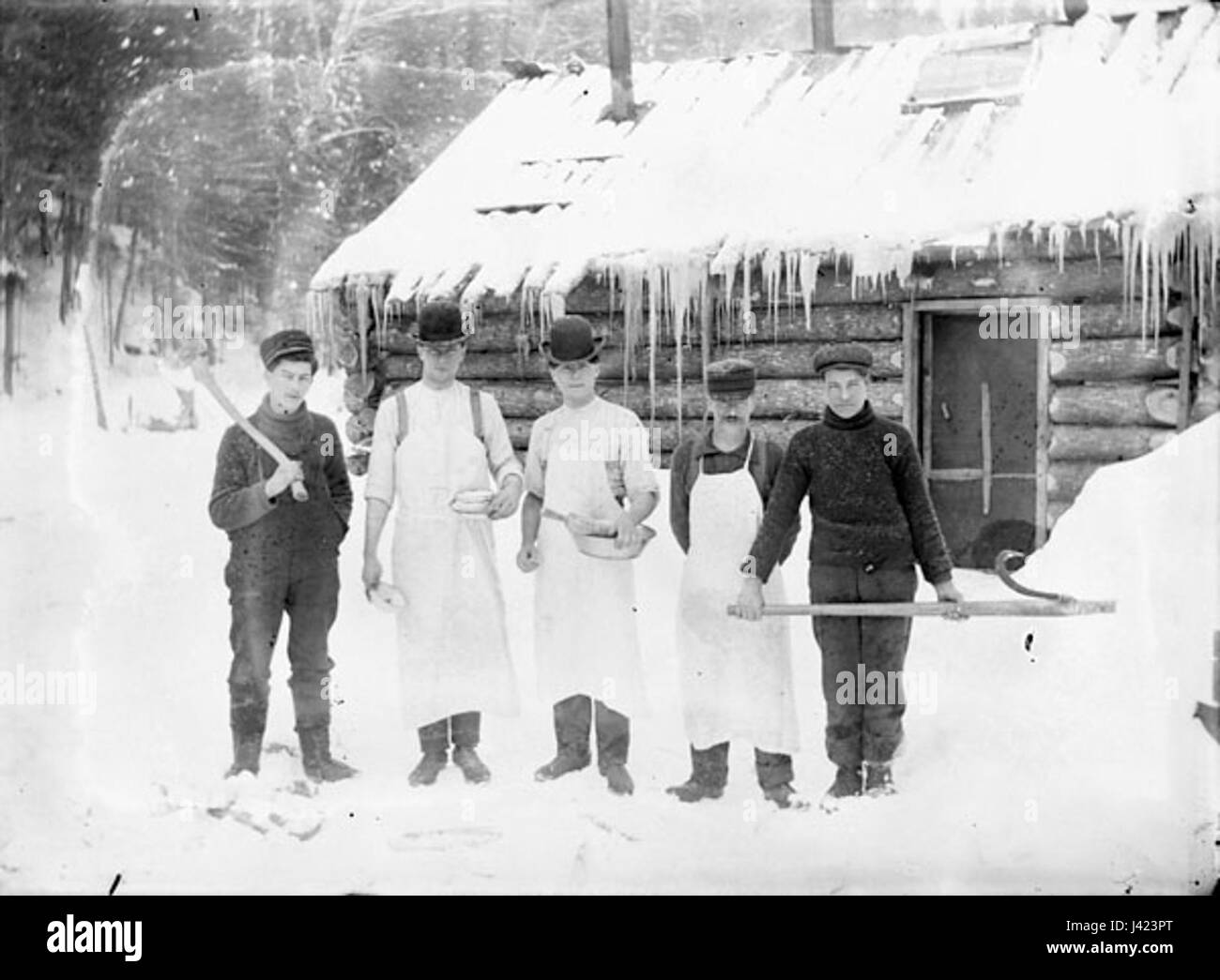 This image depicts a lumber camp in the Ottawa Valley, a region ...