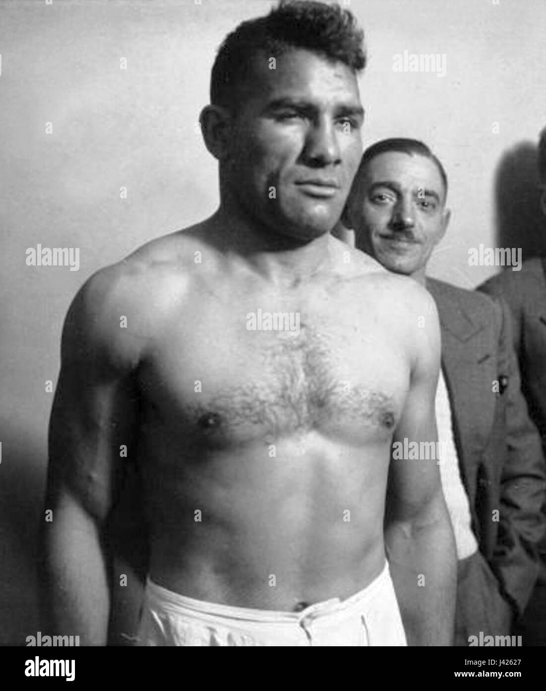 Marcel Thil, a prominent French boxer, is captured in 1934, likely ...