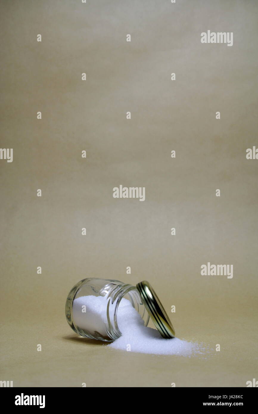 Salt Spilling from Jar Stock Photo - Alamy