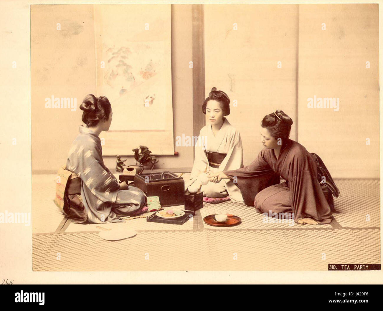 A photograph by Kusakabe Kimbei, numbered 310, showing a traditional ...