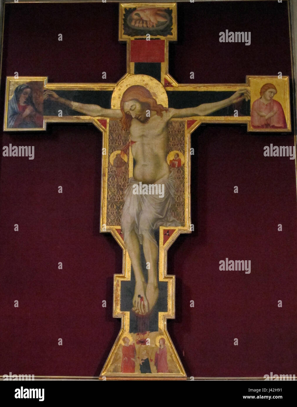 The 'Crocifisso' by Maestro del Crocifisso Corsi, dated around 1330, is ...