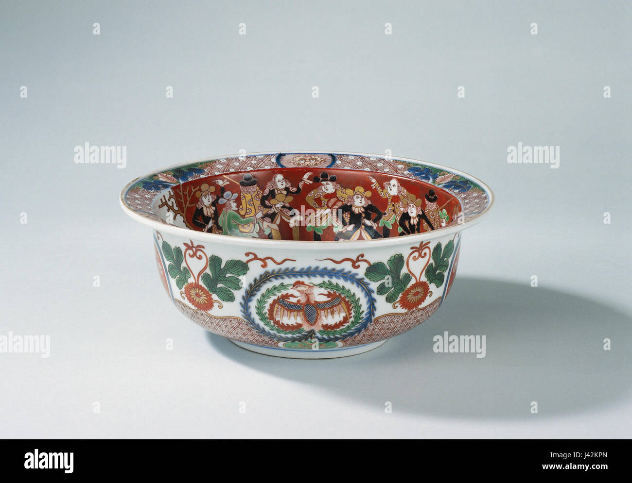 This image displays a piece of Imari porcelain, a style originating ...