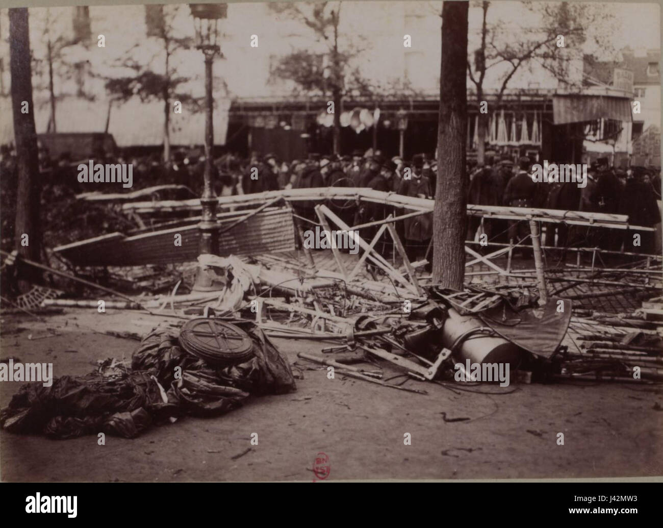 A photograph by Jules Beau, showing the remains of the Pax airship on ...