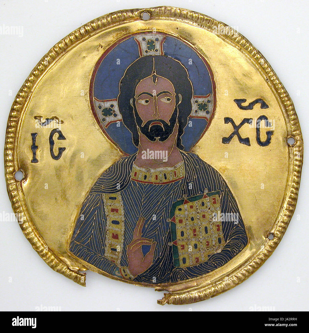 This medallion features an image of Christ, likely from an Eastern ...