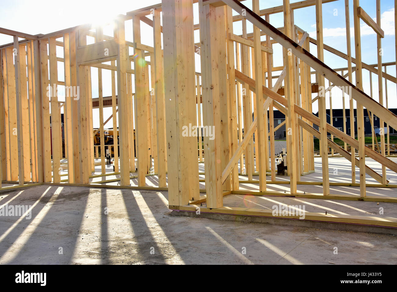 New wood frame home under construction Stock Photo - Alamy