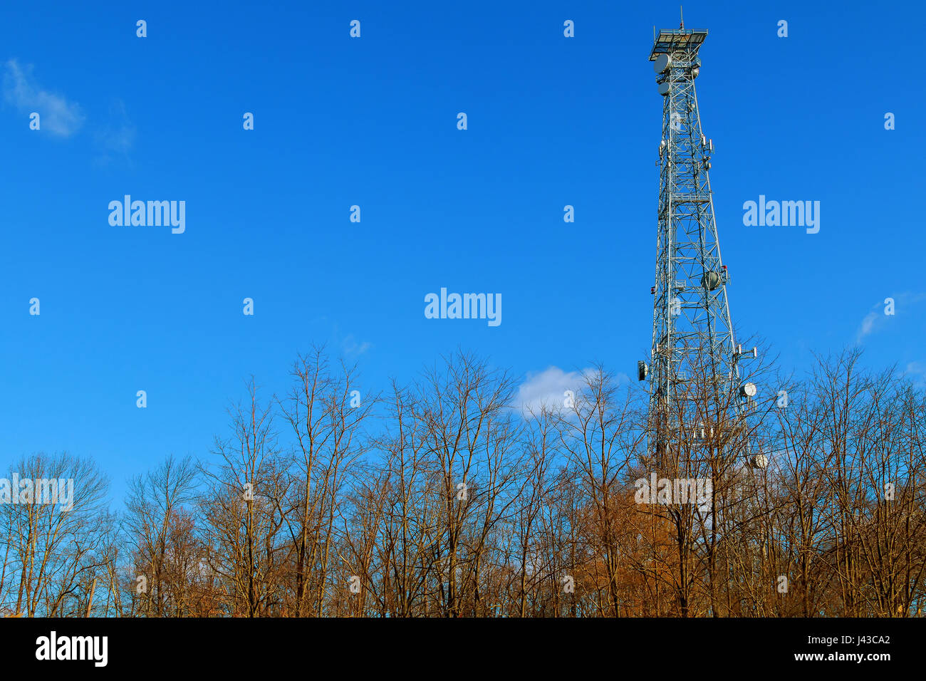 image of communication mobile internet antenna over blue sky background ...