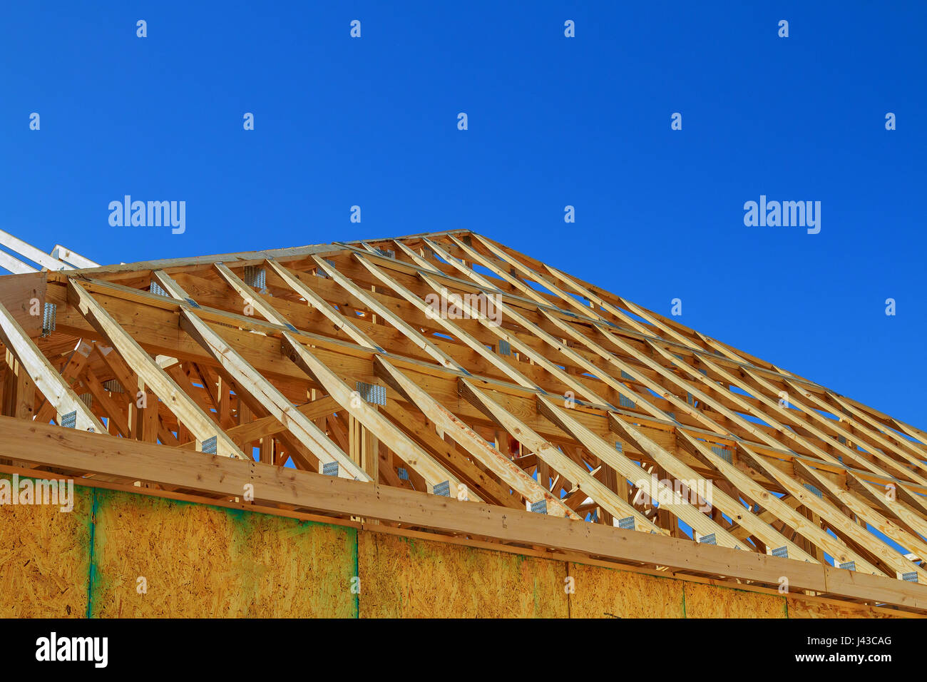 New construction of a wooden building or house Stock Photo - Alamy