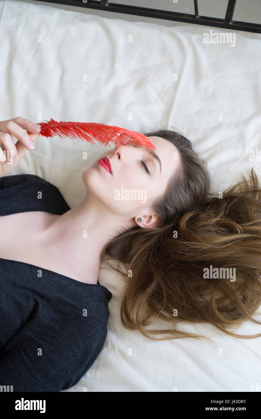 Laying face down woman eyes closed hi-res stock photography and images ...